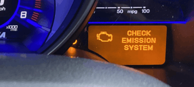 Check Emission System: What It Means, Causes, & Fixes